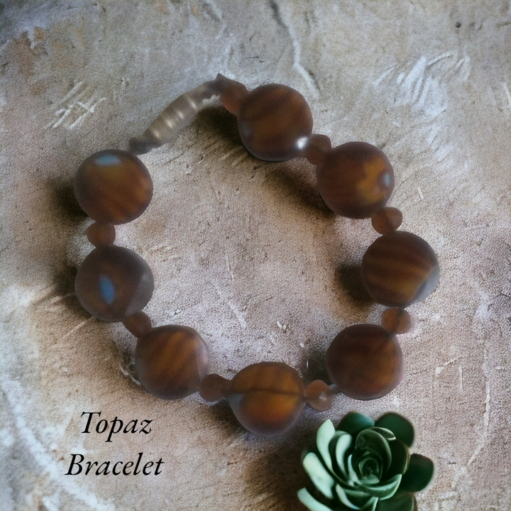 Handmade Designs by Di- Unique handcrafted jewelry for your style.